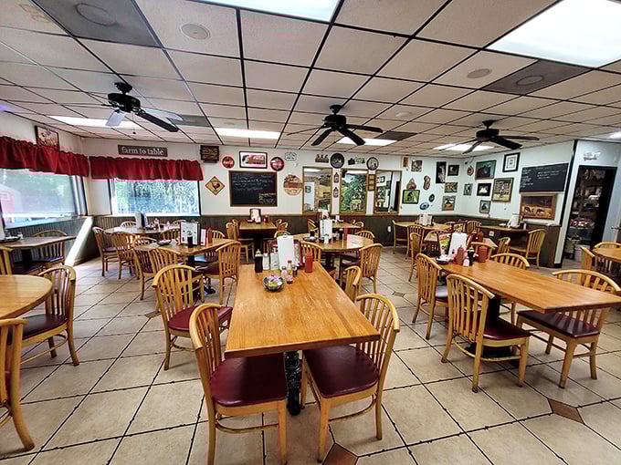 Inside, wooden chairs and memorabilia-covered walls create that perfect diner atmosphere where conversations flow as freely as the coffee.