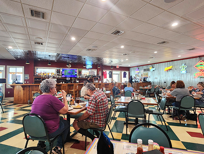 Checkered floors and neon signs create that perfect "come as you are" vibe where memorable meals happen and diet plans go to die.