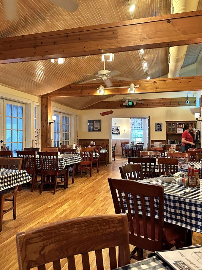 Wooden beams, checkered tablecloths, and the promise of comfort food &ndash; this dining room feels like coming home.