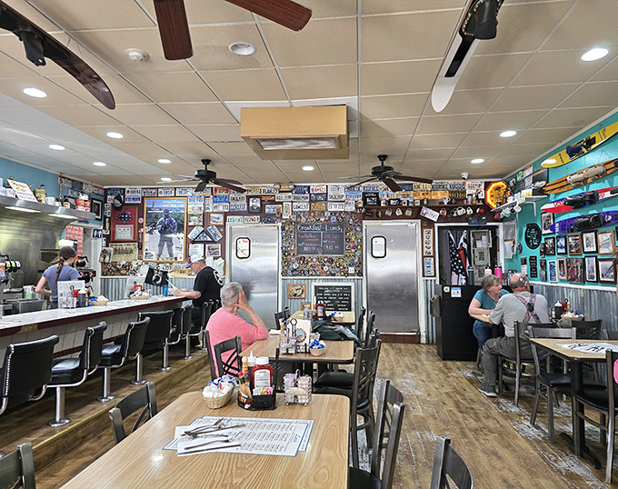 Step inside and you're greeted by walls that tell a thousand stories &ndash; license plates, photos, and memorabilia create the perfect backdrop for breakfast bliss.