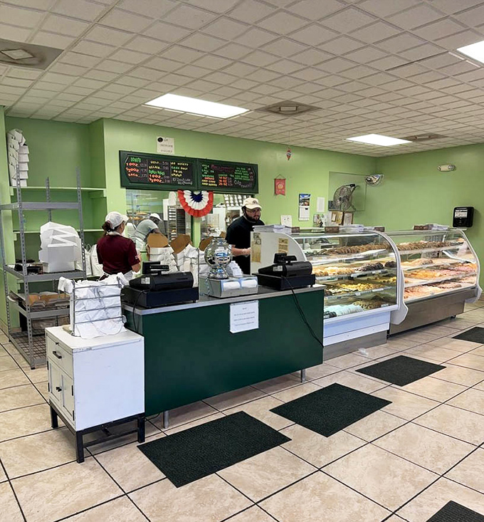 Inside, the mint green walls and curved display cases create a time capsule of donut perfection. This is where morning dreams come true, one glazed masterpiece at a time.