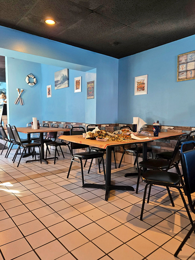 Blue walls and simple tables set the stage where Maryland's finest seafood traditions meet Pennsylvania's welcoming hospitality beautifully.