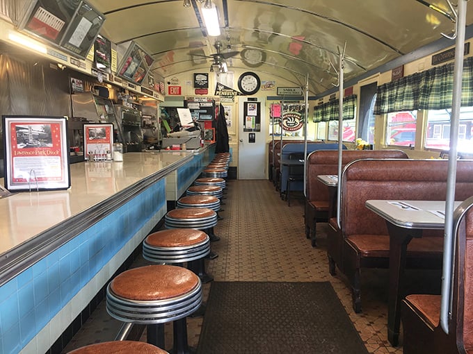 Classic diner counter seating where spinning on stools is technically allowed, though your maturity level may vary accordingly.