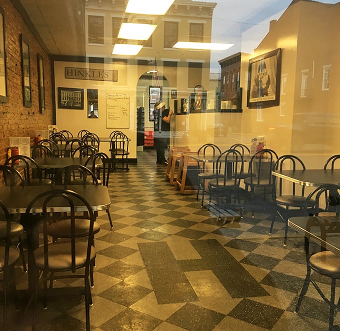 Step inside and time stands still. The checkered floor and simple tables whisper stories of countless satisfied diners who came before you.