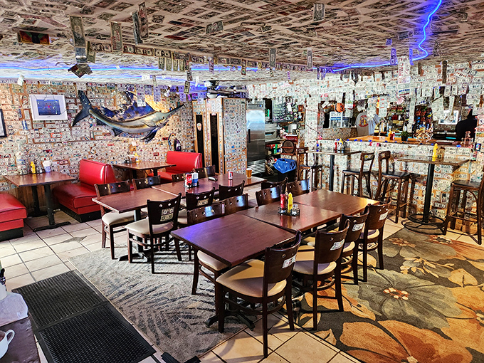 Dollar bills tell a thousand stories on these walls. The Ski Inn's interior is part currency museum, part time capsule, with blue neon lighting the way to burger bliss.