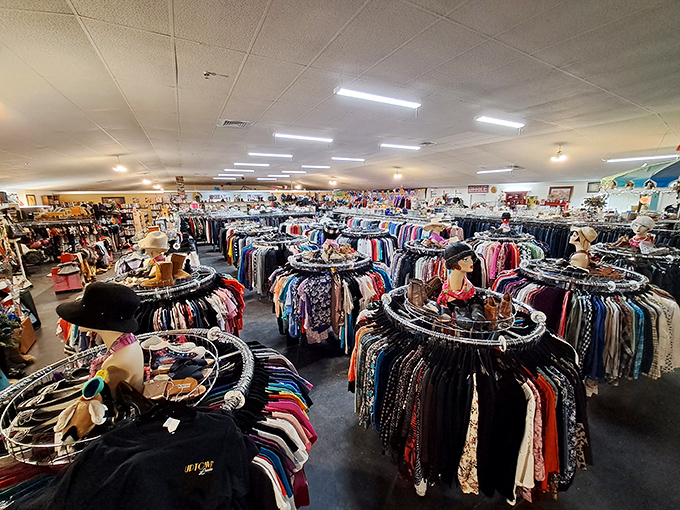 Circular racks create a mesmerizing galaxy of second-hand treasures. Like planets in orbit, each one holds its own universe of possibilities.