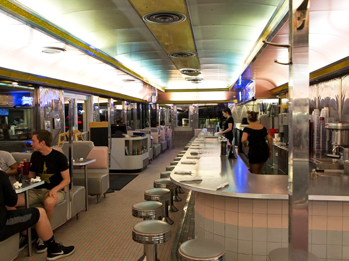 Step inside and time-travel to the golden age of diners. Those counter stools aren't just seats&mdash;they're front-row tickets to culinary theater.