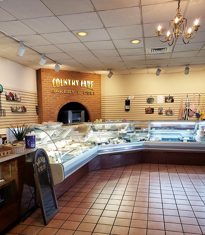 Behind this brick archway lies a world of culinary treasures. The deli counter at Country Fare isn't just a food display&mdash;it's a gallery of edible art.