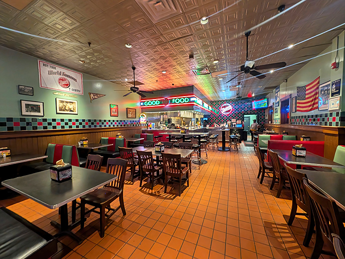 Classic Americana at its finest &ndash; red booths, checkerboard tiles, and a pressed tin ceiling that's witnessed decades of satisfied sighs. Diner perfection.