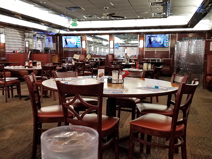 Inside, the warm wood tones and classic diner seating create that perfect "everybody knows your name" vibe. Comfort begins before the first coffee refill.