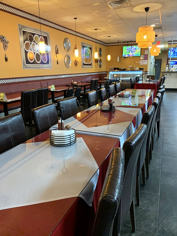 Warm yellow walls and pendant lighting create an atmosphere that says "relax and stay awhile" &ndash; your taste buds are about to embark on an adventure.