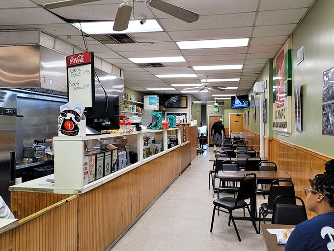 No-frills interior where sandwich artistry happens. The wooden counter has witnessed thousands of "first bite" moments of pure joy.