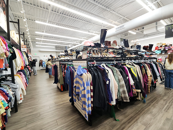Racks upon racks of carefully organized clothing stretch toward industrial ceilings. It's like Narnia for fashion lovers with realistic budgets.