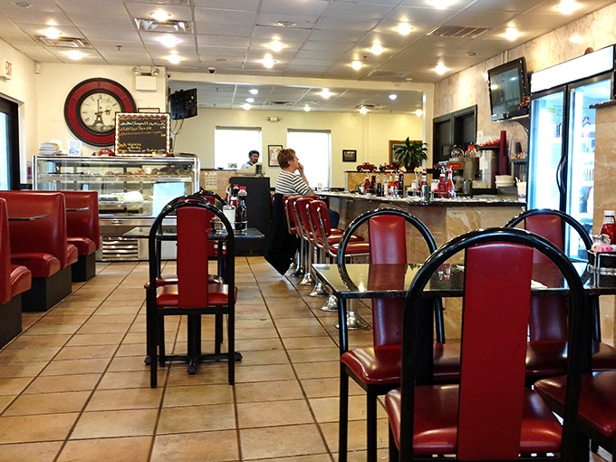 Classic red vinyl and chrome transport you back to simpler times, when counter seats were the front-row tickets to the greatest show on earth: breakfast.