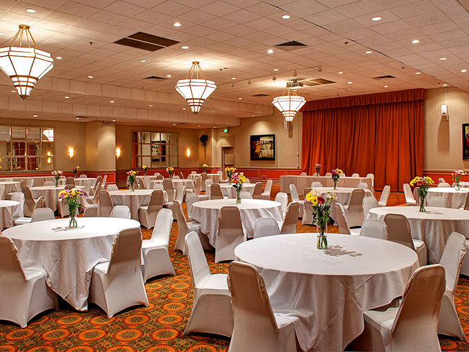 White tablecloths, elegant lighting, and room to breathe. The banquet space whispers "special occasion" without shouting "stuffy formality."