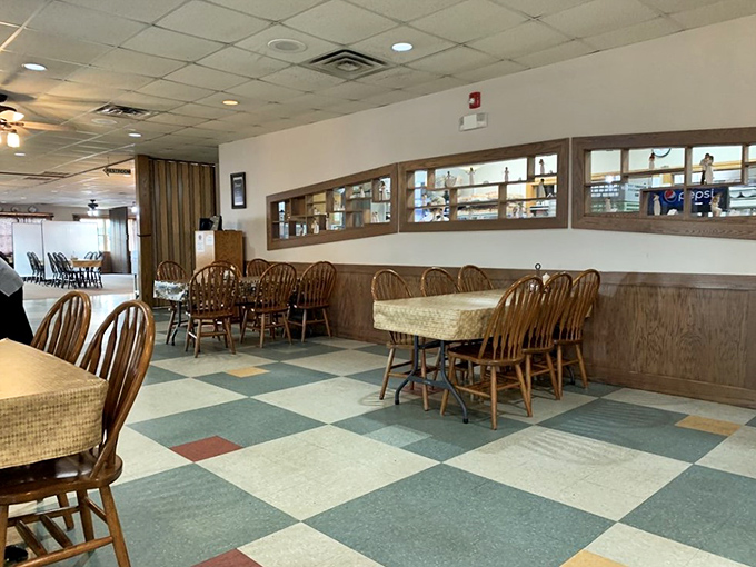 The checkerboard floor and wooden chairs whisper "grandma's house," but with better seating capacity and air conditioning.