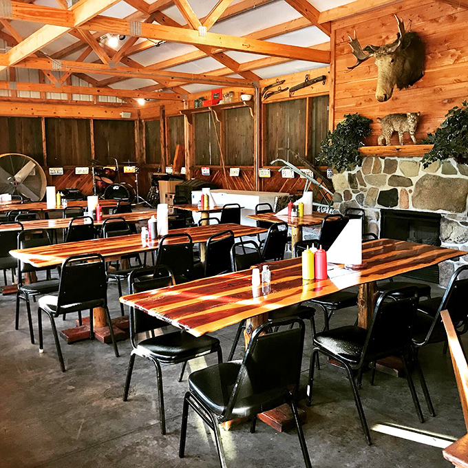 Rustic wooden beams, mounted trophies, and tables ready for feasting &ndash; this isn't just dining, it's a Missouri backwoods experience with napkins.
