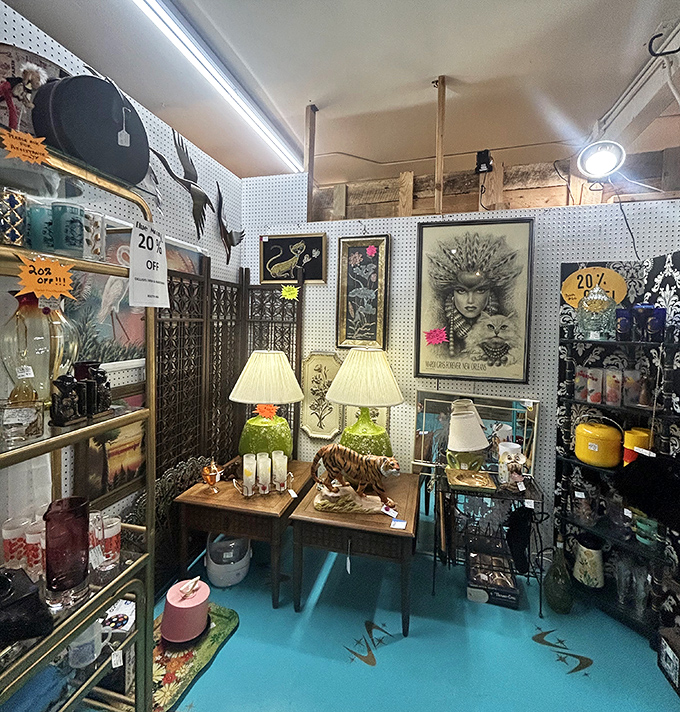 A tiger lamp prowls among eclectic treasures in this booth. One person's kitsch is another's conversation piece.
