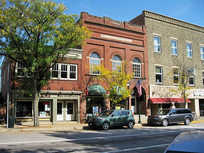 Fall foliage frames these century-old brick buildings, where modern businesses thrive in vintage shells. Small-town America doesn't get more picture-perfect than this.