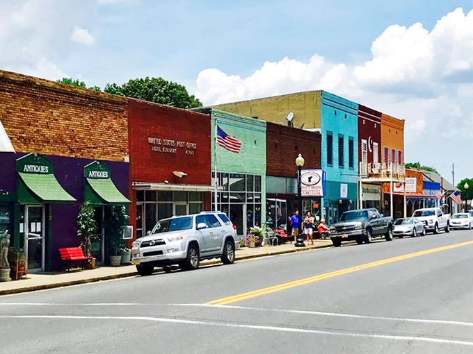 The post office stands as the town's red-bricked heartbeat, where mail arrives and local news travels even faster.