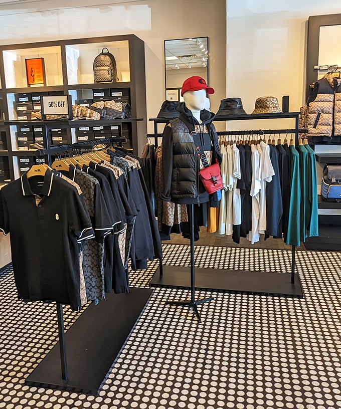 Designer displays that whisper "treat yourself" while your wallet quietly weeps. The mannequin seems to be judging your hesitation.