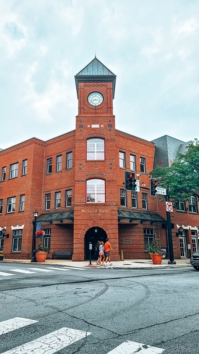 The iconic clock tower of the Michael R. Walker Building stands sentinel over downtown, a red-brick guardian of Kennett Square's timeless appeal.