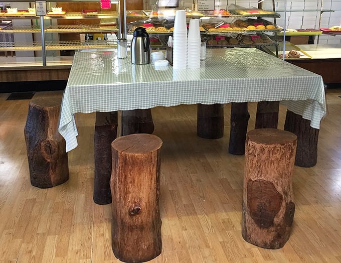 Rustic log seating that makes IKEA look unnecessarily complicated. Coffee tastes better when your chair used to be a tree&mdash;it's just science.