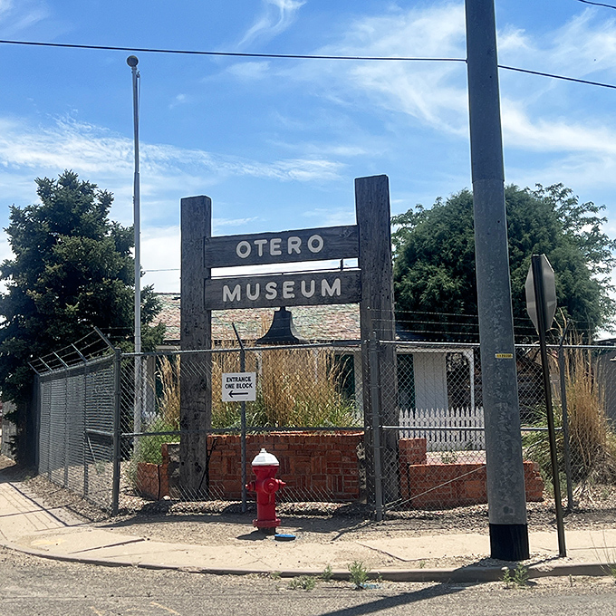 The Otero Museum sign stands guard like a friendly sentinel to the past. That fire hydrant isn't just functional&mdash;it's practically the town's unofficial greeter.