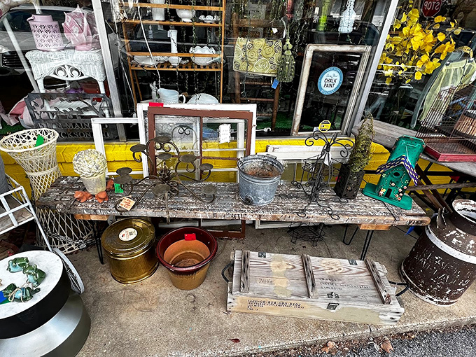 This weathered workbench display is what happens when your garden and grandpa's workshop have a beautiful reunion.