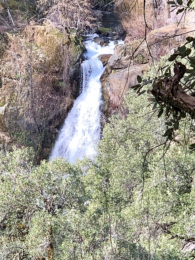 The first glimpse through the trees feels like discovering a secret level in a video game &ndash; Potem Falls revealing itself between California's rugged terrain.