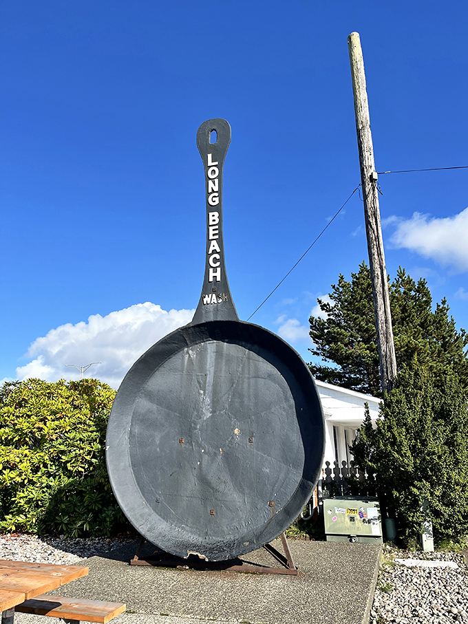 Against a perfect blue sky, this colossal culinary icon proclaims its hometown pride with "LONG BEACH WASH" emblazoned on its impressive handle.