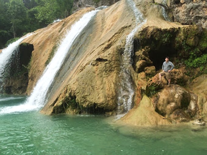 Nature's own infinity pool! This cascading waterfall creates the kind of swimming hole that makes you question why anyone invented chlorine.