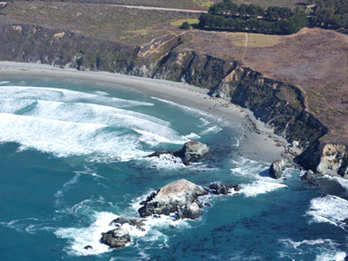 The aerial view that makes you question your vacation choices elsewhere. Sand Dollar's pristine shoreline looks like nature showing off.