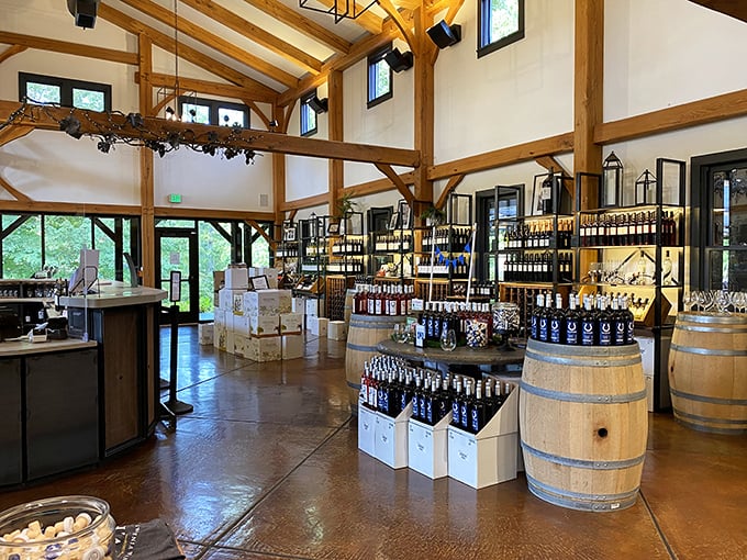 Soaring timber ceilings and bottle-lined walls create a cathedral-like space where wine is the religion of choice.