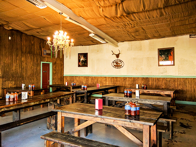 Elegance meets rustic charm with that unexpected chandelier. Who says you can't enjoy world-class barbecue under crystal lighting? It's like Versailles for meat lovers.