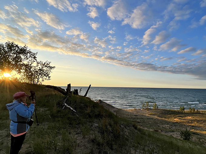 Nature's own light show at Mount Baldy. That moment when the sun breaks through and you realize Indiana's been hiding coastal magic all along.