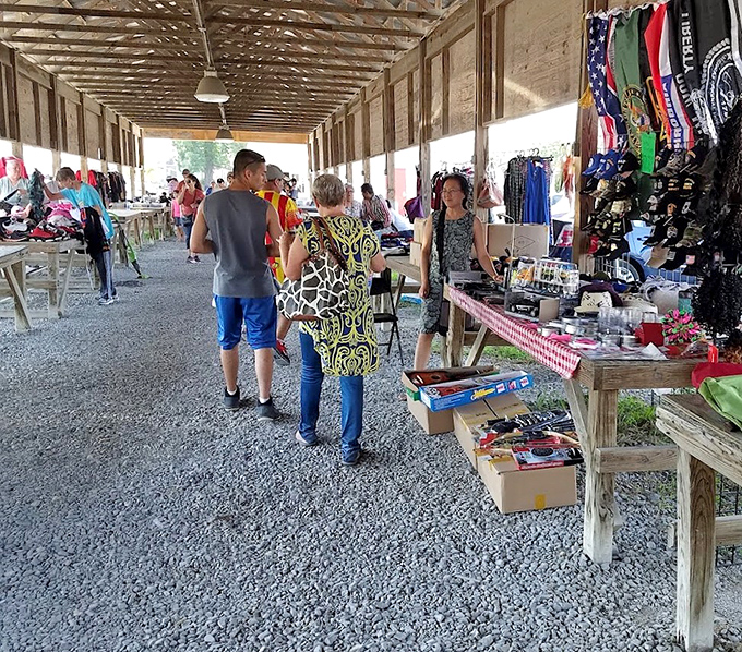 Weekend warriors navigate the gravel pathways, eyes scanning for that perfect something they didn't know they needed until this very moment.