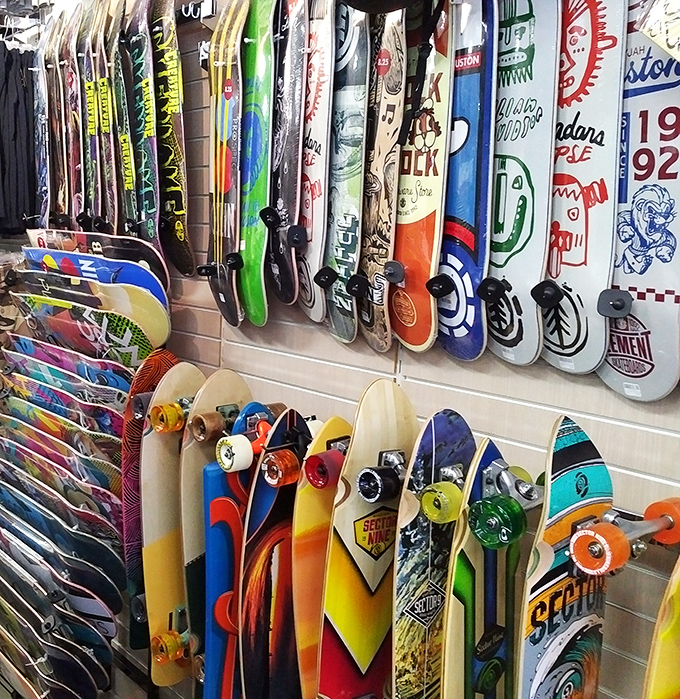 A skateboard enthusiast's dream wall &ndash; where your inner Tony Hawk meets your outer budget constraints in a colorful display of possibilities.