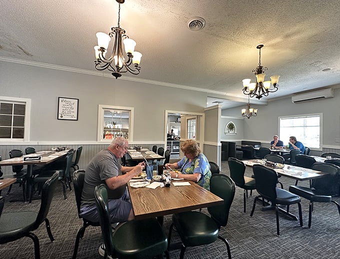Simple elegance defines the dining room, where chandeliers cast a gentle glow over tables where food-focused conversations and satisfied sighs regularly occur.