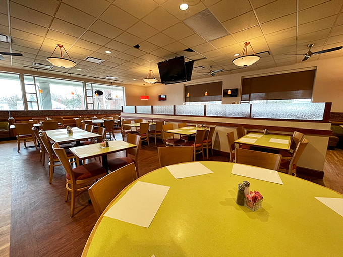Yellow tables and wooden chairs create that perfect "come as you are" vibe where comfort trumps pretension and conversations flow as easily as the coffee.