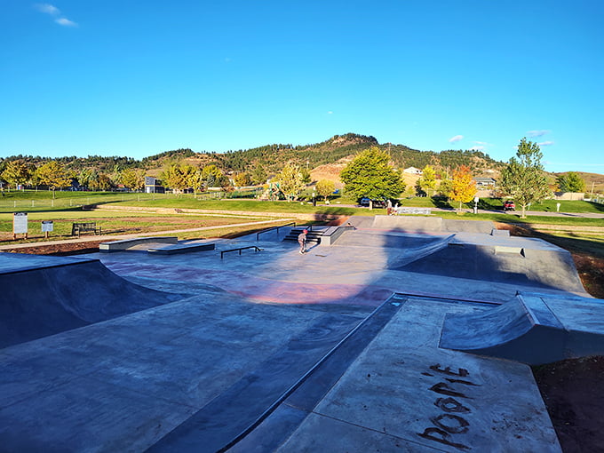 Local skaters call this concrete playground their second home. Nothing says "we value our youth" like a well-designed skate park with mountain views.