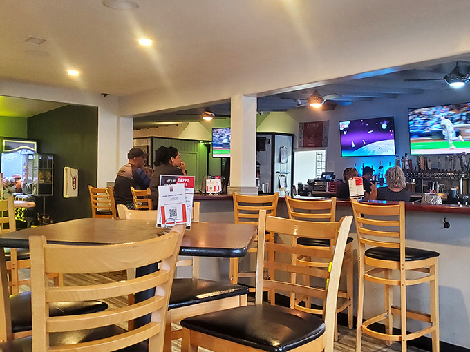 The dining area balances sports bar energy with barbecue joint soul &ndash; where watching the game comes with a side of smoky perfection.