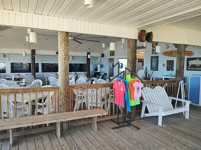 Beach-casual perfection—wooden beams, Adirondack chairs, and colorful t-shirts for sale create that "I've discovered somewhere special" feeling every Florida explorer craves.