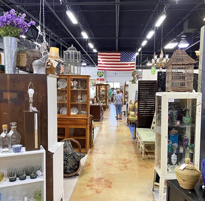 Long aisles of possibility stretch before you, each booth a different chapter in America's story, complete with patriotic backdrop.