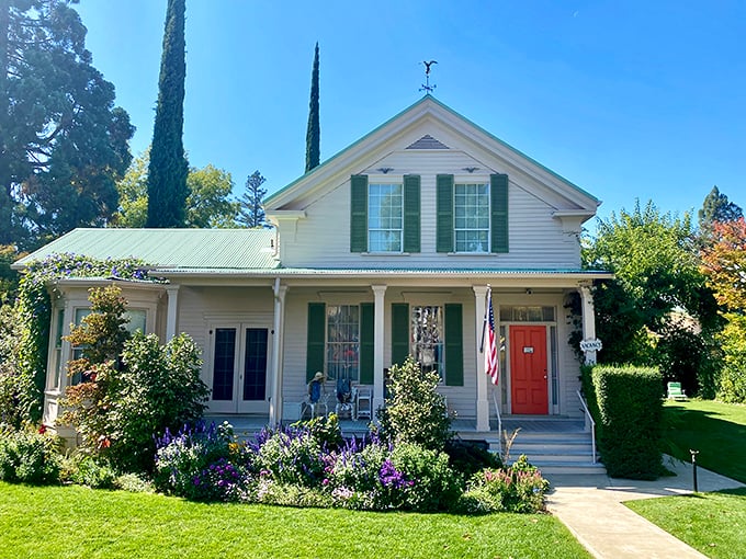 This picture-perfect Victorian cottage could make HGTV fans weep with joy. The white picket fence and colorful garden scream "weekend escape fantasy."
