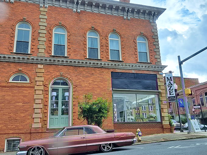 The Maze storefront with its classic brick fa&ccedil;ade and vintage car out front &ndash; where shopping feels like time travel with credit cards.