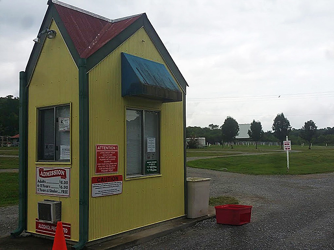 This cheerful yellow ticket booth isn't just an entrance&mdash;it's a time portal to simpler days when entertainment came with fresh air and fireflies.