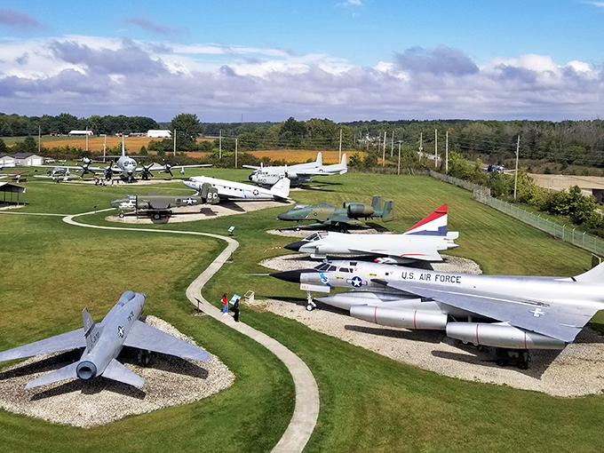 Winding pathways guide visitors through decades of aerial innovation. Each aircraft tells a story of engineering triumph and human courage.