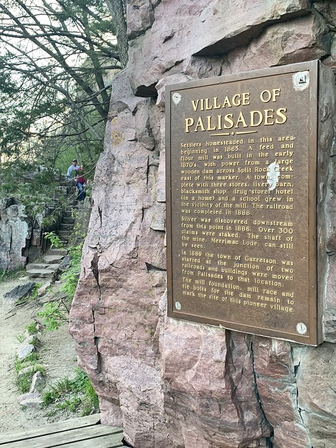 History carved in stone. This plaque reveals Palisades' fascinating past as a bustling mill town before the rocks became famous for recreation rather than industry.