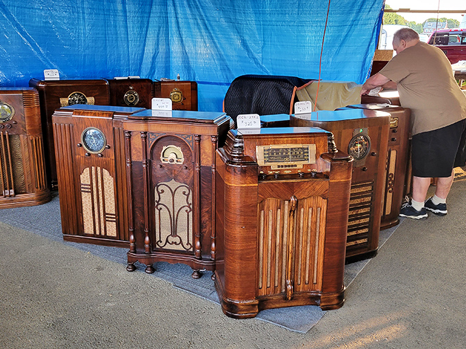 These vintage radio cabinets aren't just electronics; they're time machines disguised as furniture, ready to transport you back to evenings gathered around for "The Shadow."